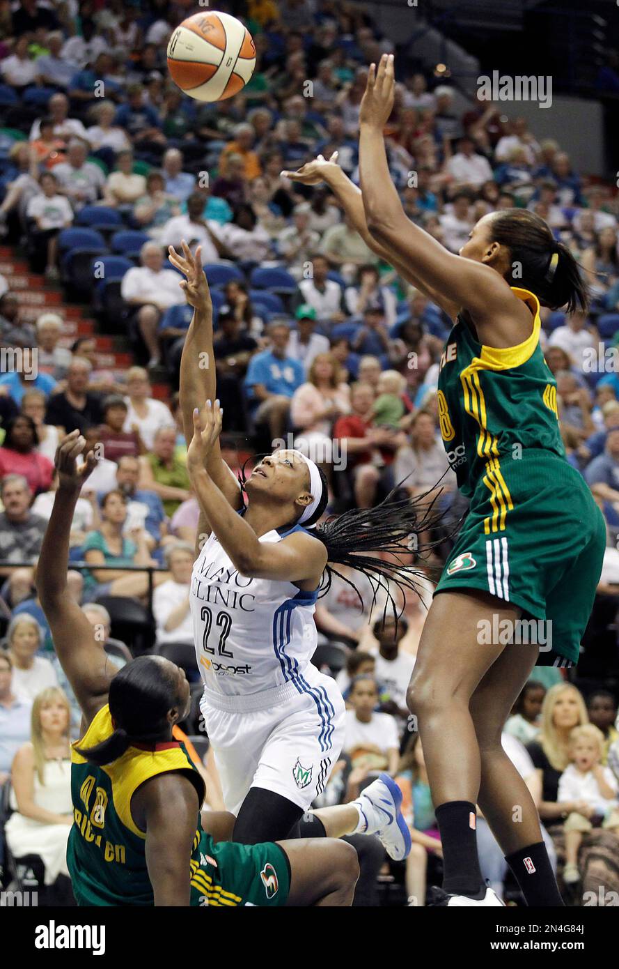 Minnesota Lynx guard Monica Wright pushes through Seattle Storm guard ...