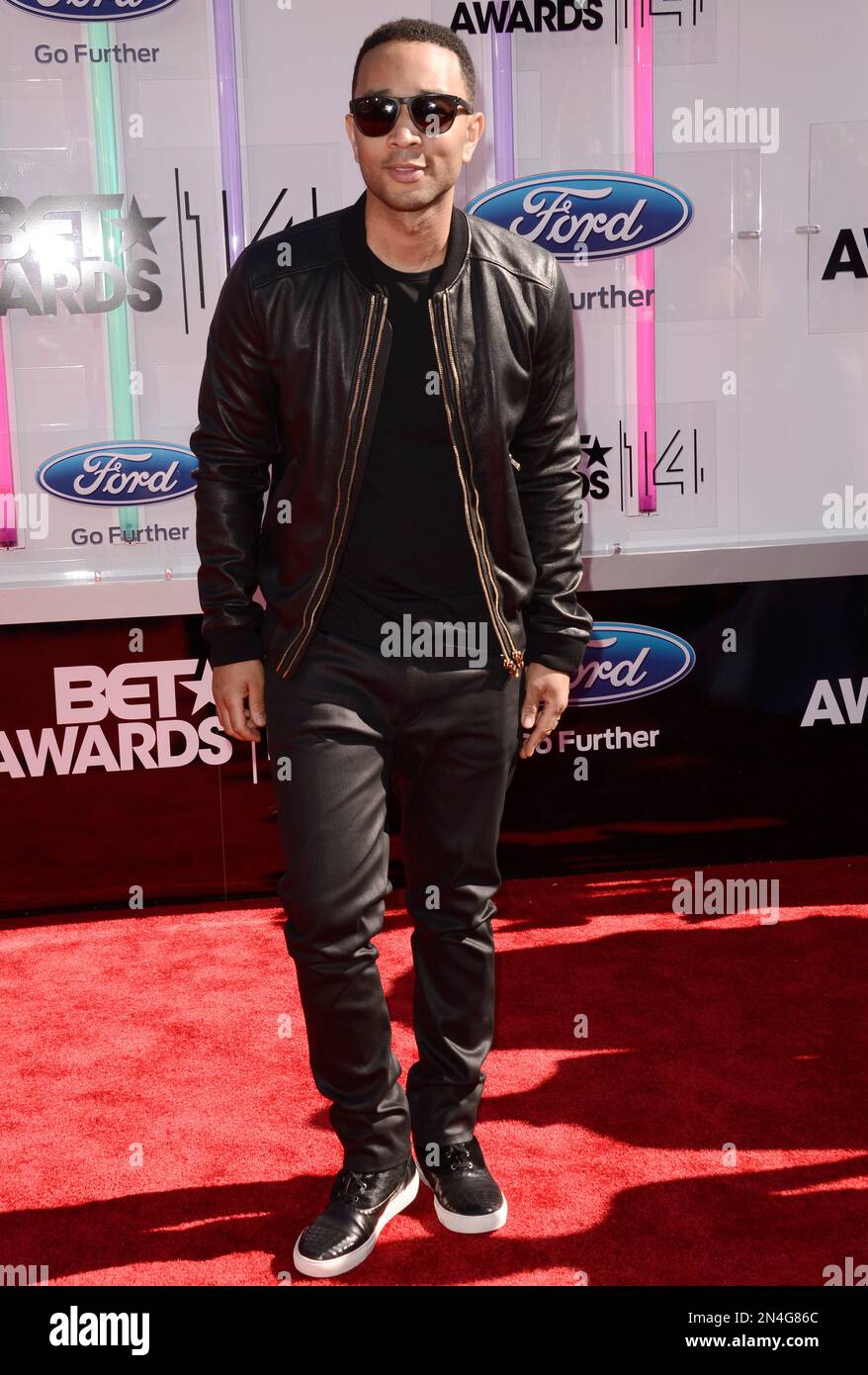 John Legend arrives at the BET Awards at the Nokia Theatre on Sunday ...