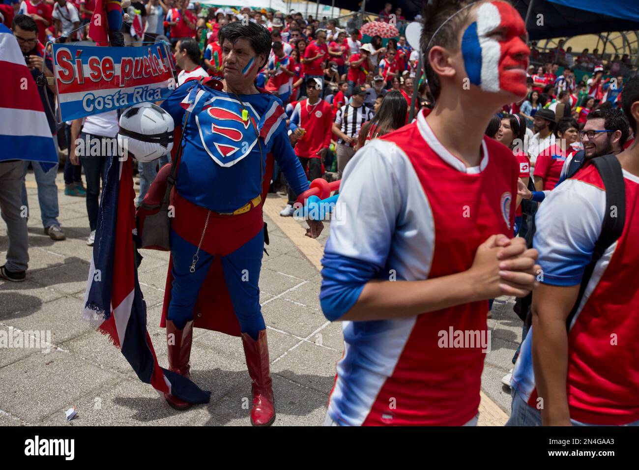 A Costa Rican soccer fan dresses up as superman as he prepares to watch ...