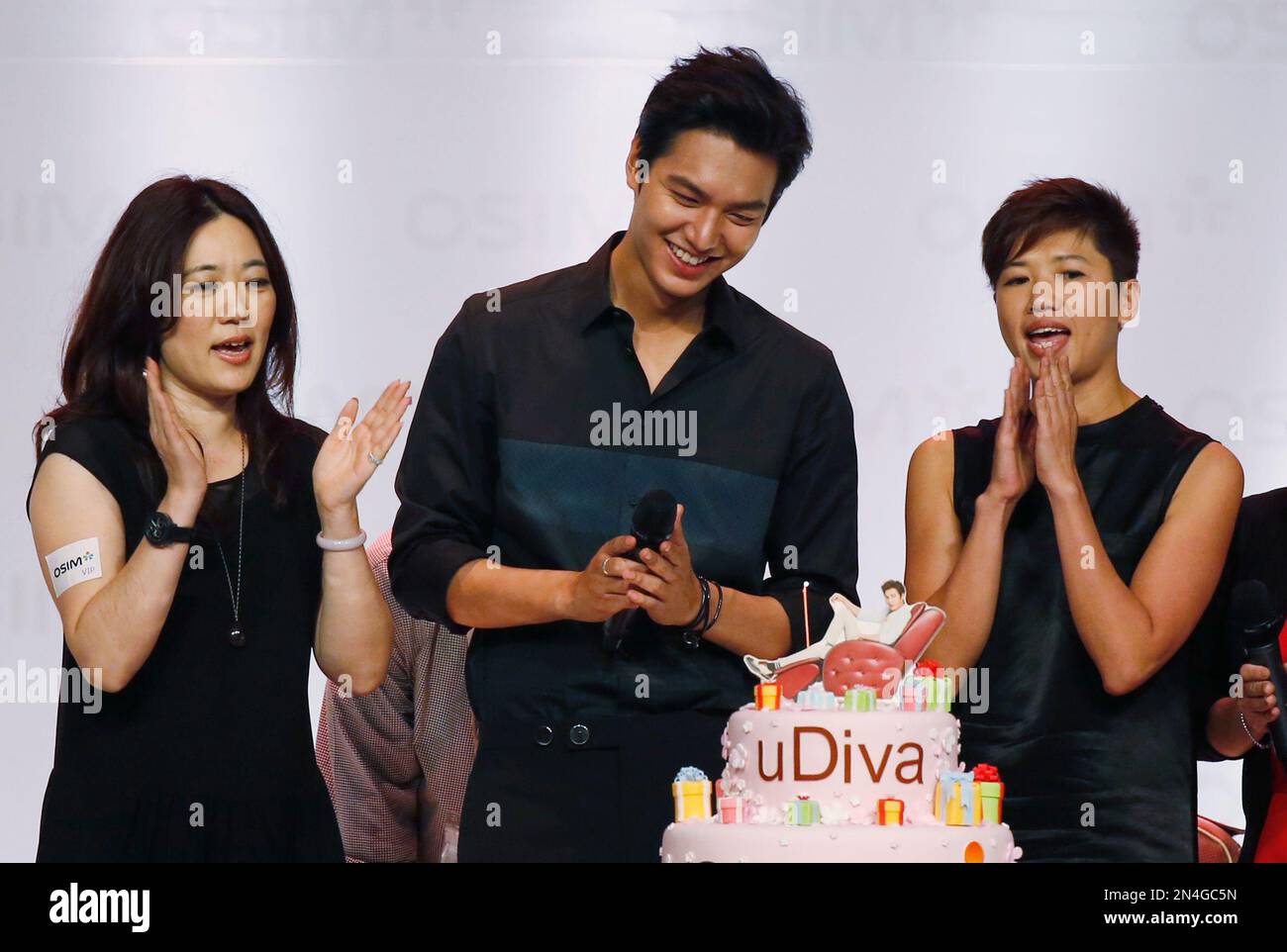 Fans sing a birthday song to South Korean actor Lee Min-ho, center ...