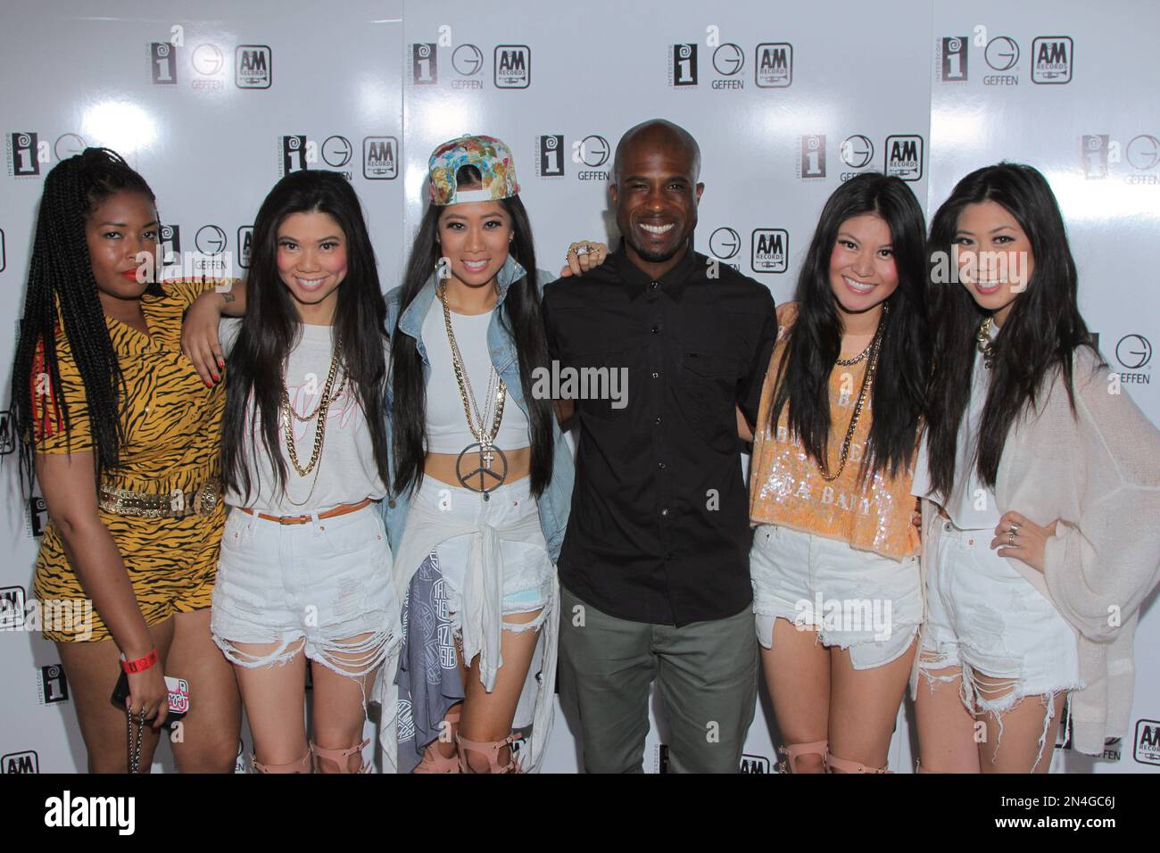 Bruce Wayne, center with The Jazmin SIster and Kyndra Reevey, far left ...