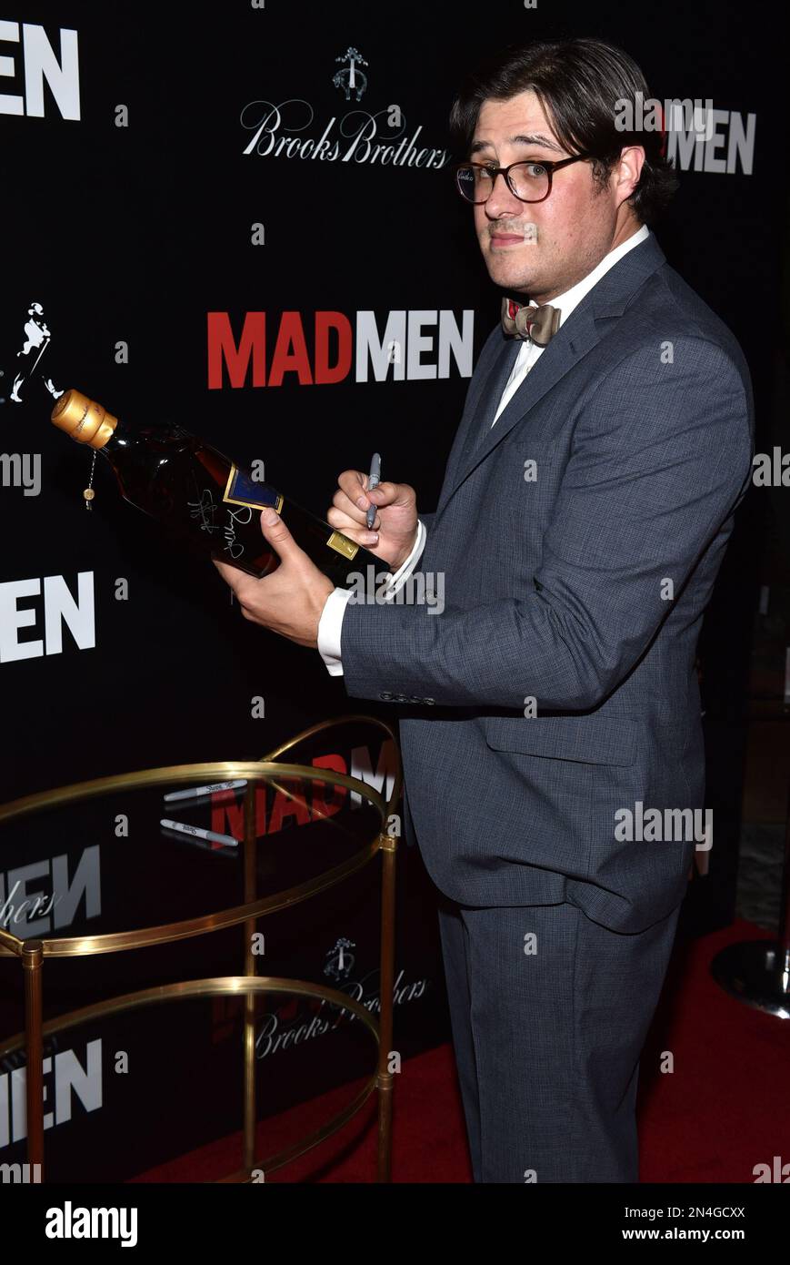 EXCLUSIVE - Rich Sommer dressed in Brooks Brothers signs a personalized ...