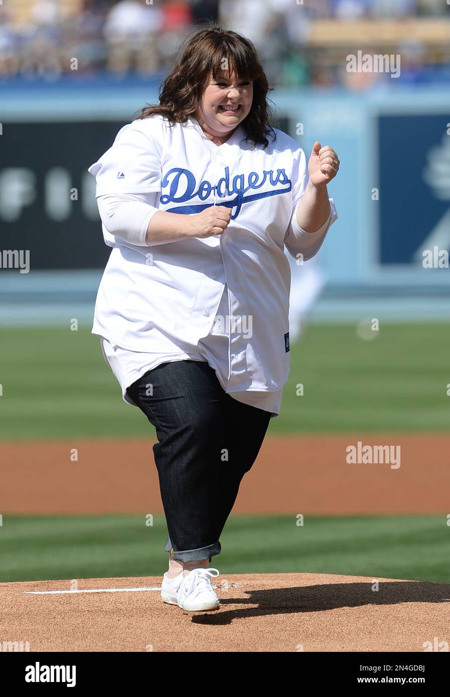 Actress Melissa McCarthy reacts after she threw out the ceremonial ...
