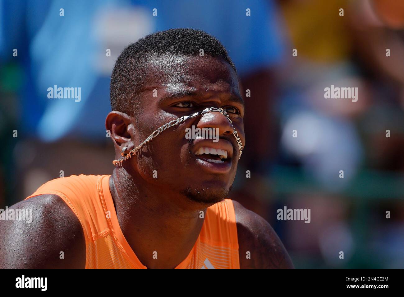 Kyle Clemons gets up after falling at the finish of the men's 400 ...