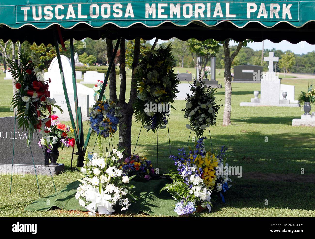 Flowers cover the grave of Cooper Harris at the Tuscaloosa Memorial ...