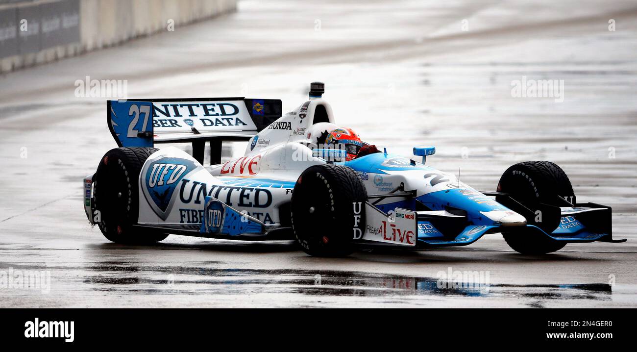 James Hinchcliffe, of Canada, drives through Turn 3 during the first of ...