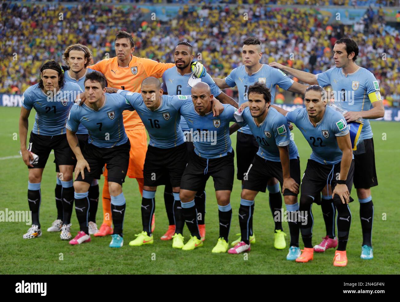 The Uruguay team pose for a group photo before the World Cup round of ...