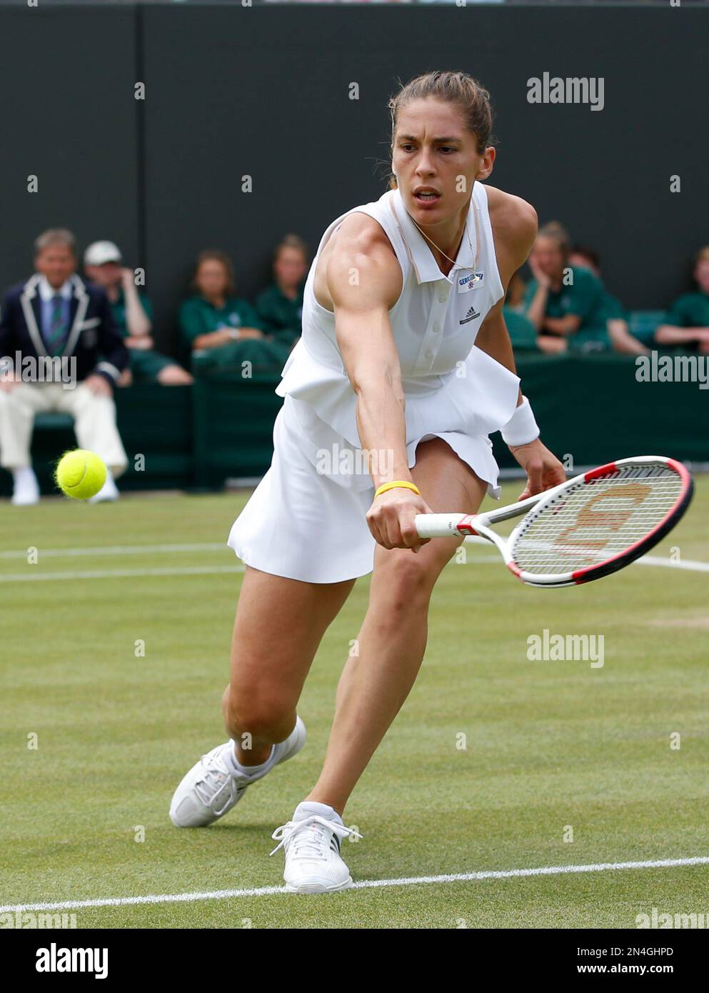 Andrea Petkovic of Germany plays a return to Eugenie Bouchard of Canada ...