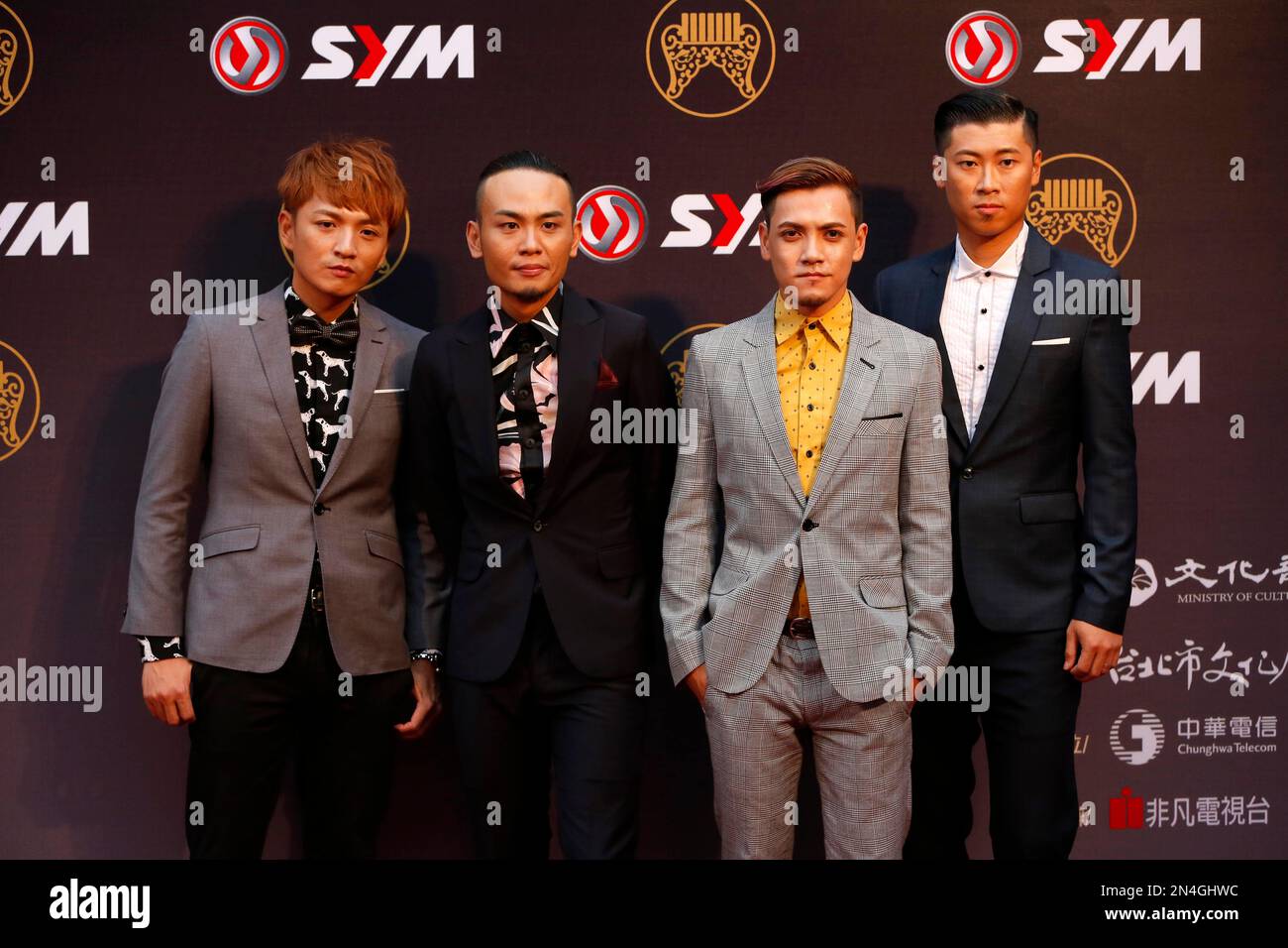 Taiwanese pop group FIRE EX. pose for photos upon arrival at the 25th ...