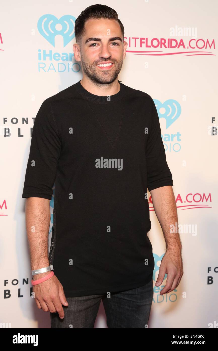 DJ E.V. arrives at the iHeartRadio Ultimate Pool Party Presented by ...