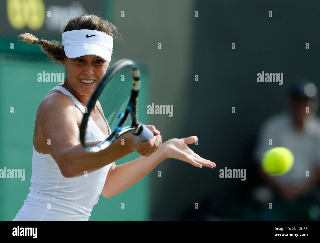 Michelle Larcher De Brito of Portugal plays a return to Agnieszka ...