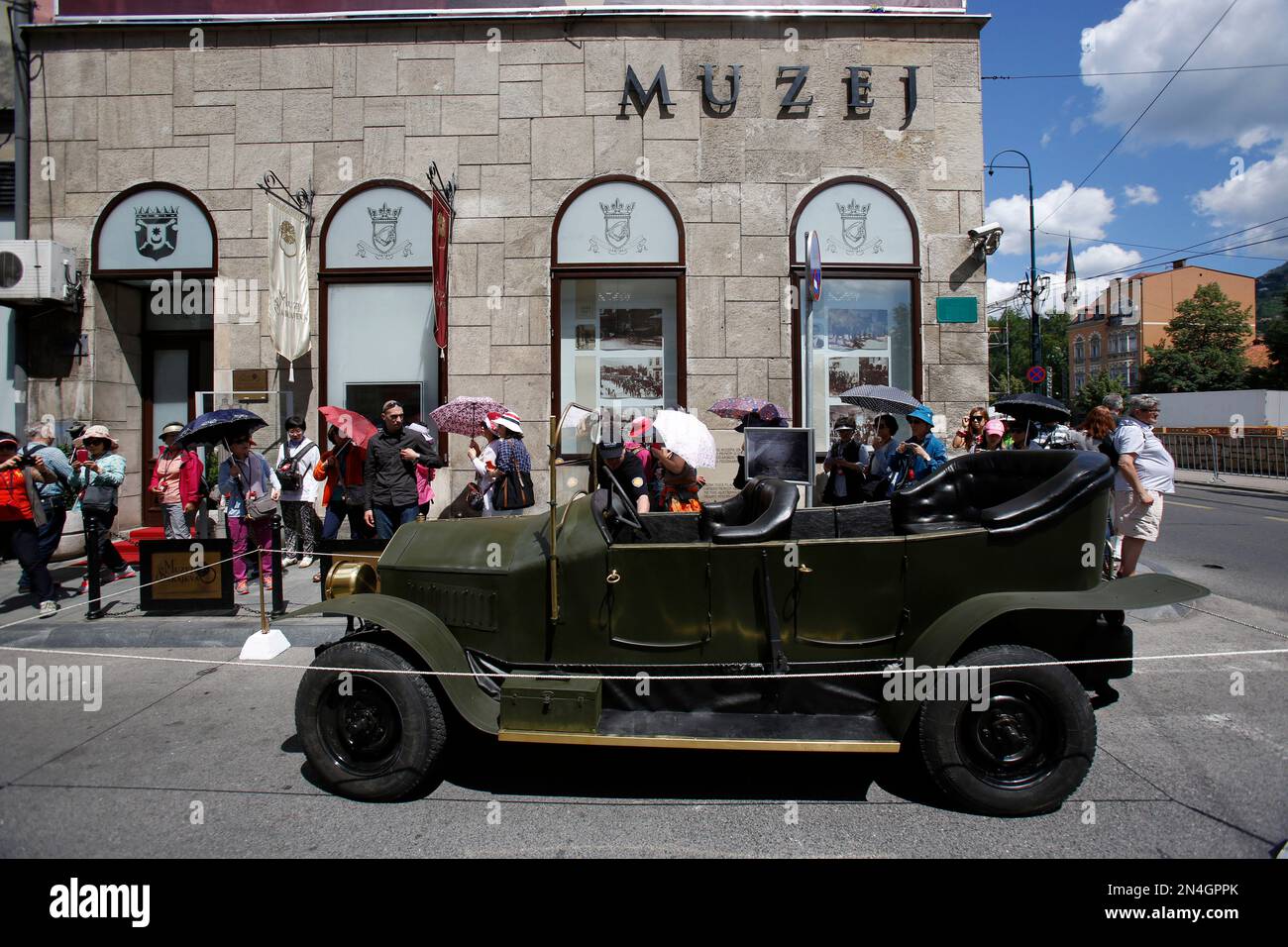 Tourists gather on Friday, June 27, 2014, around replica of the "Graf ...