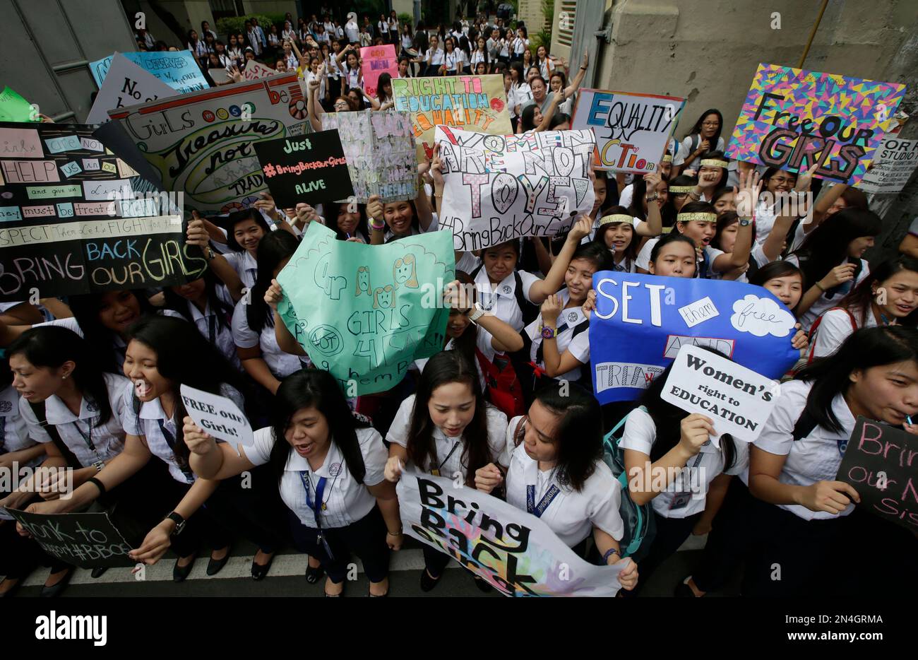 Students from St. Scholastica's College, a Catholic school in Manila ...