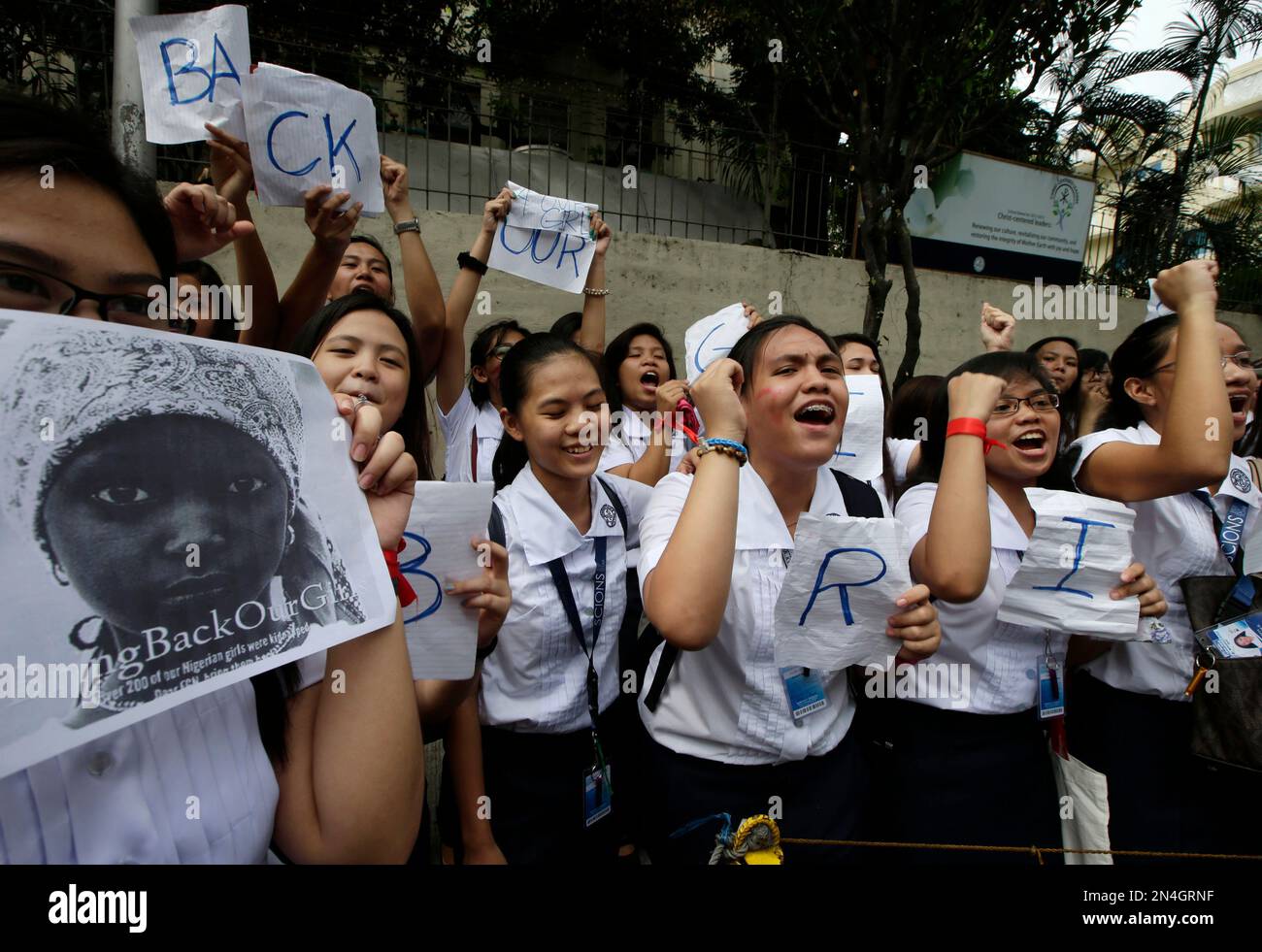 Students from St. Scholastica's College, a Catholic school in Manila ...
