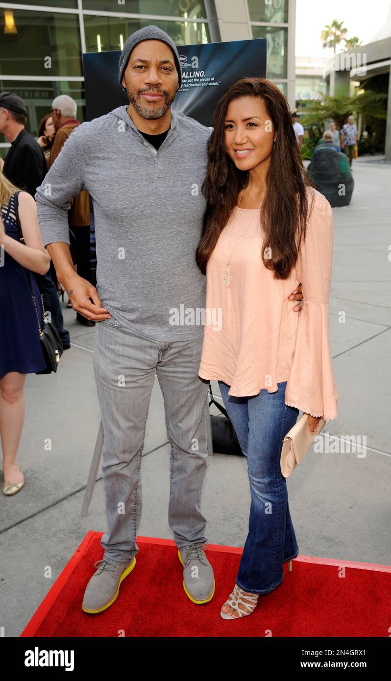 Screenwriter John Ridley and his wife Gayle pose together at the ...