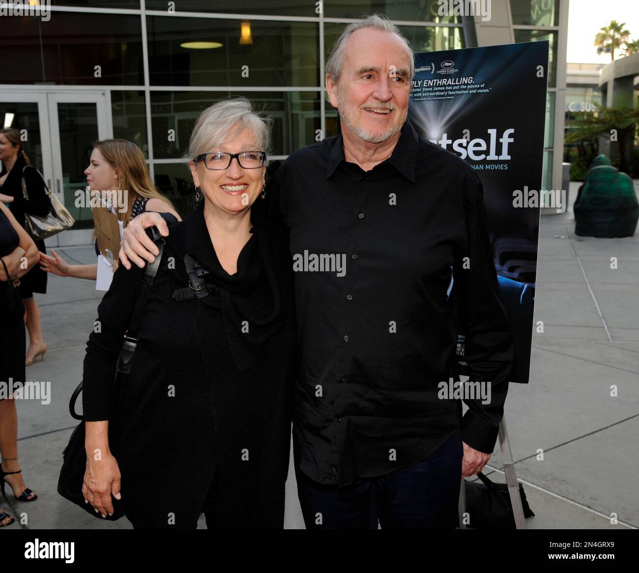 Director Wes Craven and his wife Iya pose together at the premiere of ...
