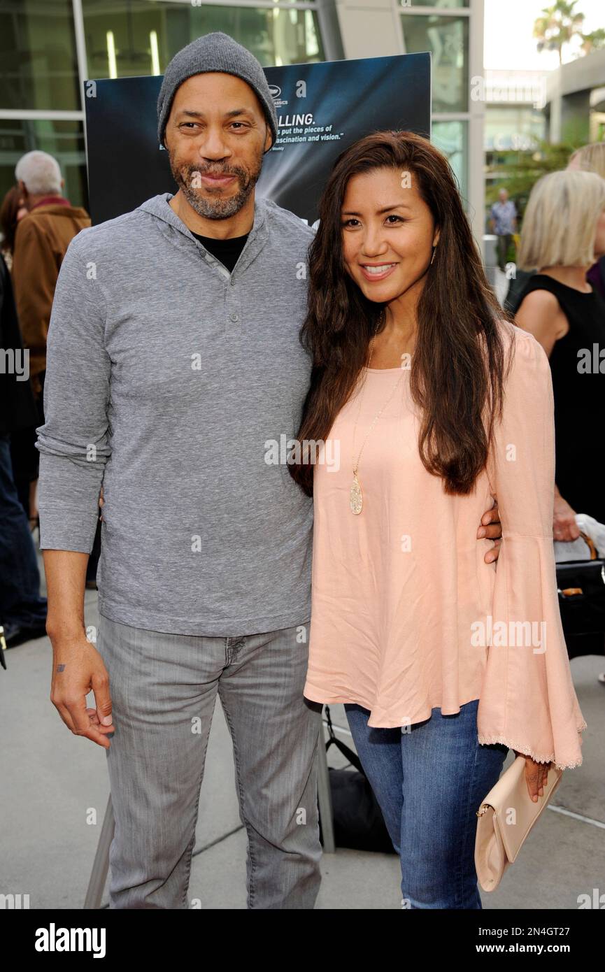Screenwriter John Ridley and his wife Gayle pose together at the ...