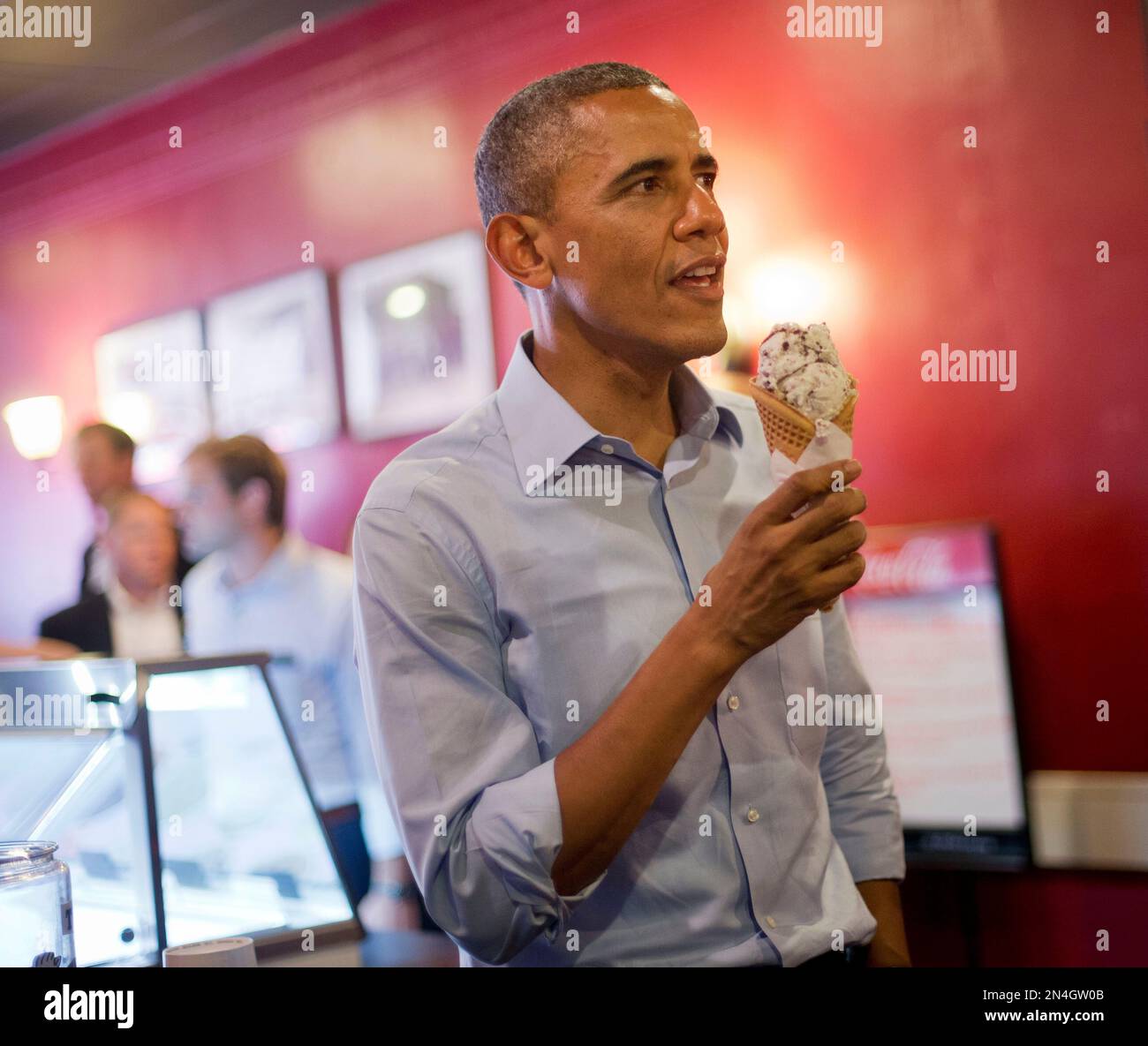 President Barack Obama holds his ice cream cone during a visit to Grand ...