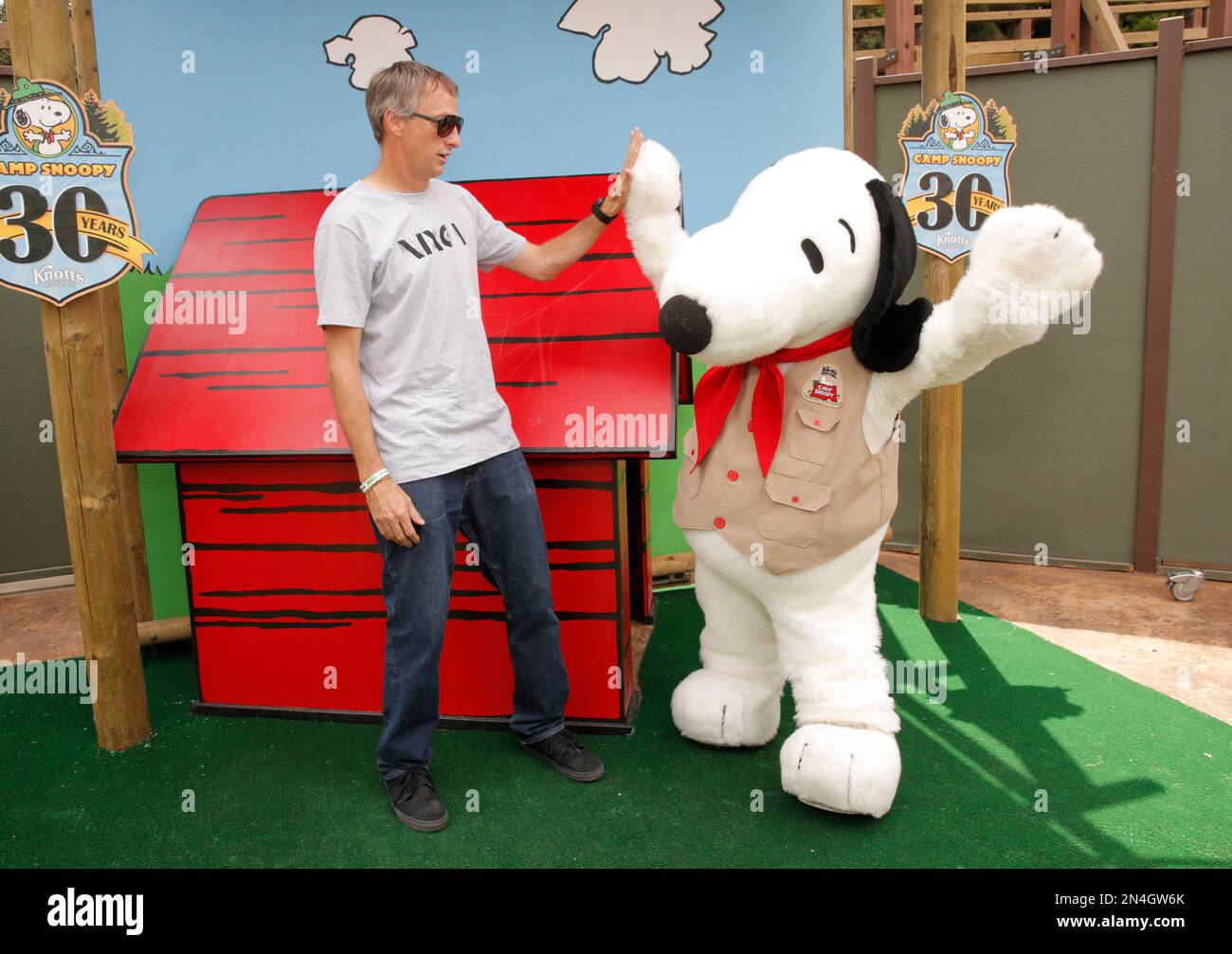 Tony Hawk and Snoopy attend the Camp Snoopy's 30th Anniversary VIP ...