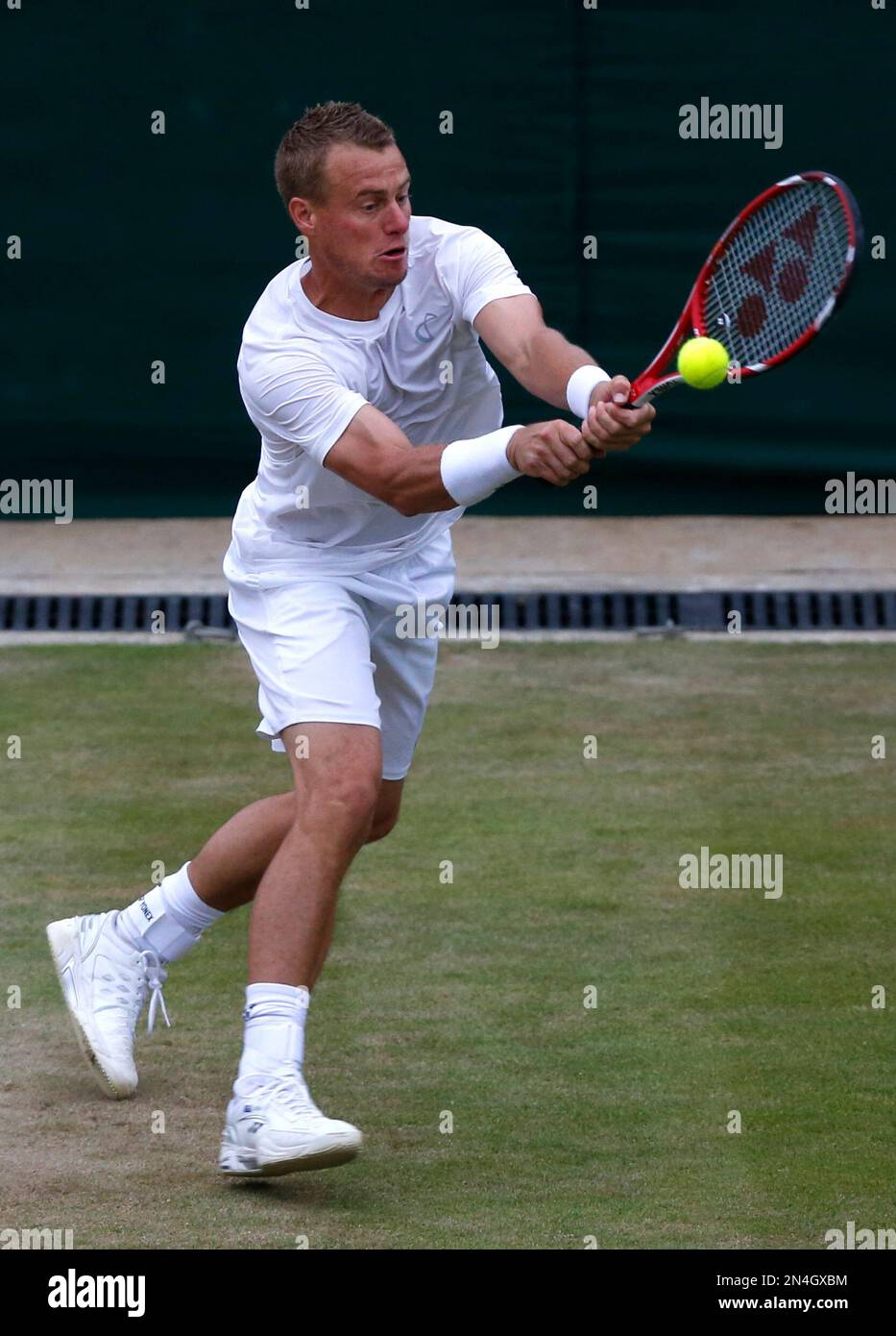 Lleyton Hewitt of Australia plays a return to Jerzy Janowicz Poland ...