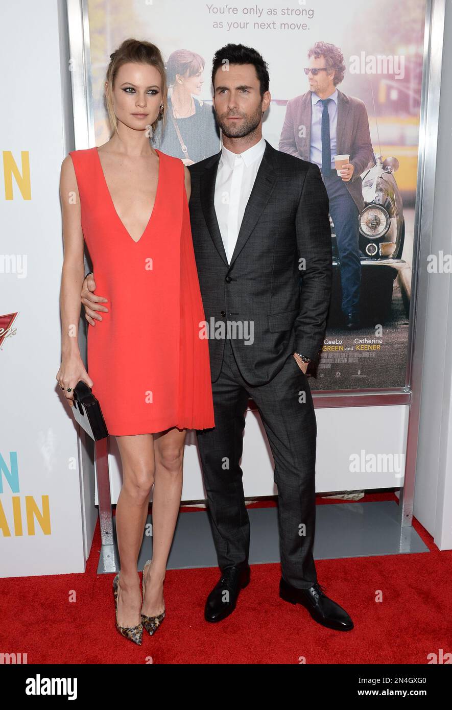 Adam Levine and fiancee Behati Prinsloo attend the premiere of "Begin ...