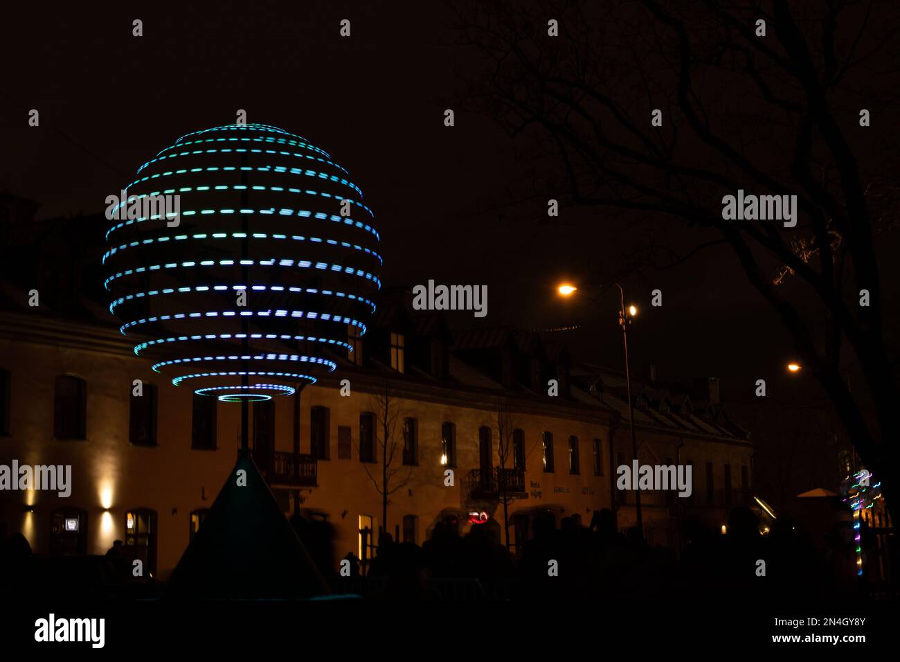 photo illuminated balloon installation outside at night Stock Photo - Alamy