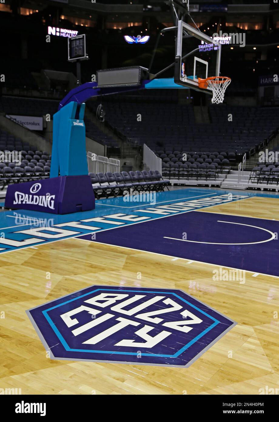 A 'Buzz City' logo is shown on the arena floor for the Charlotte ...