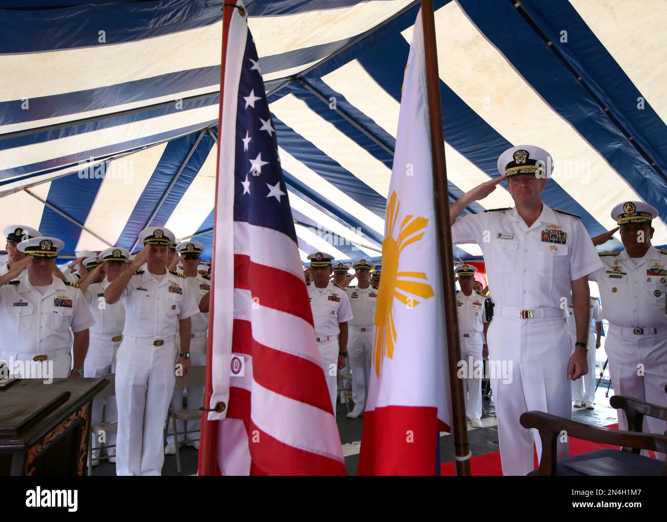 U.S. Navy Rear Adm. Stuart Munsch, second from right, Commander, Task ...
