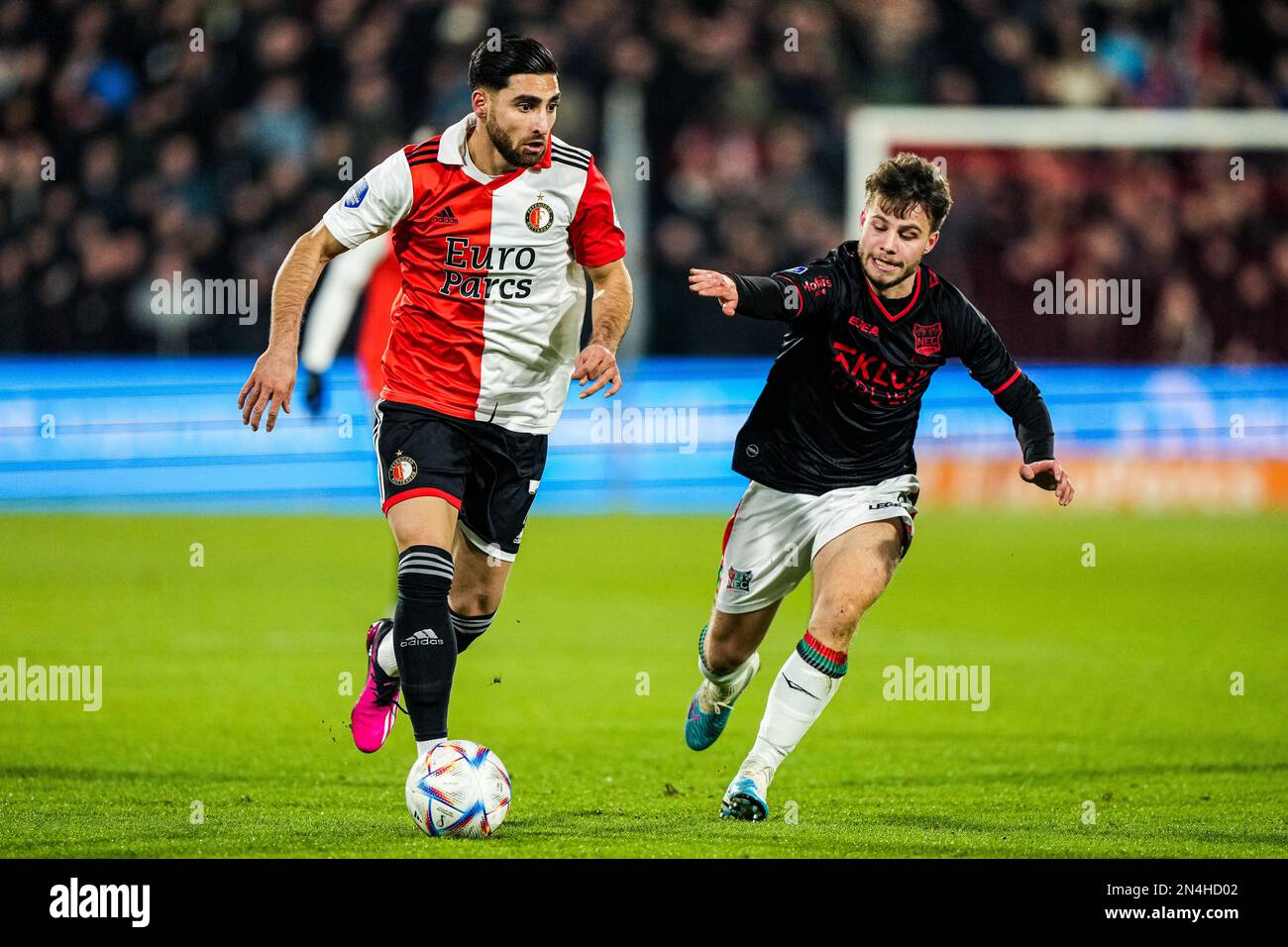 Rotterdam - Alireza Jahanbakhsh of Feyenoord, Dirk Proper of NEC Nijmegen during the match ...