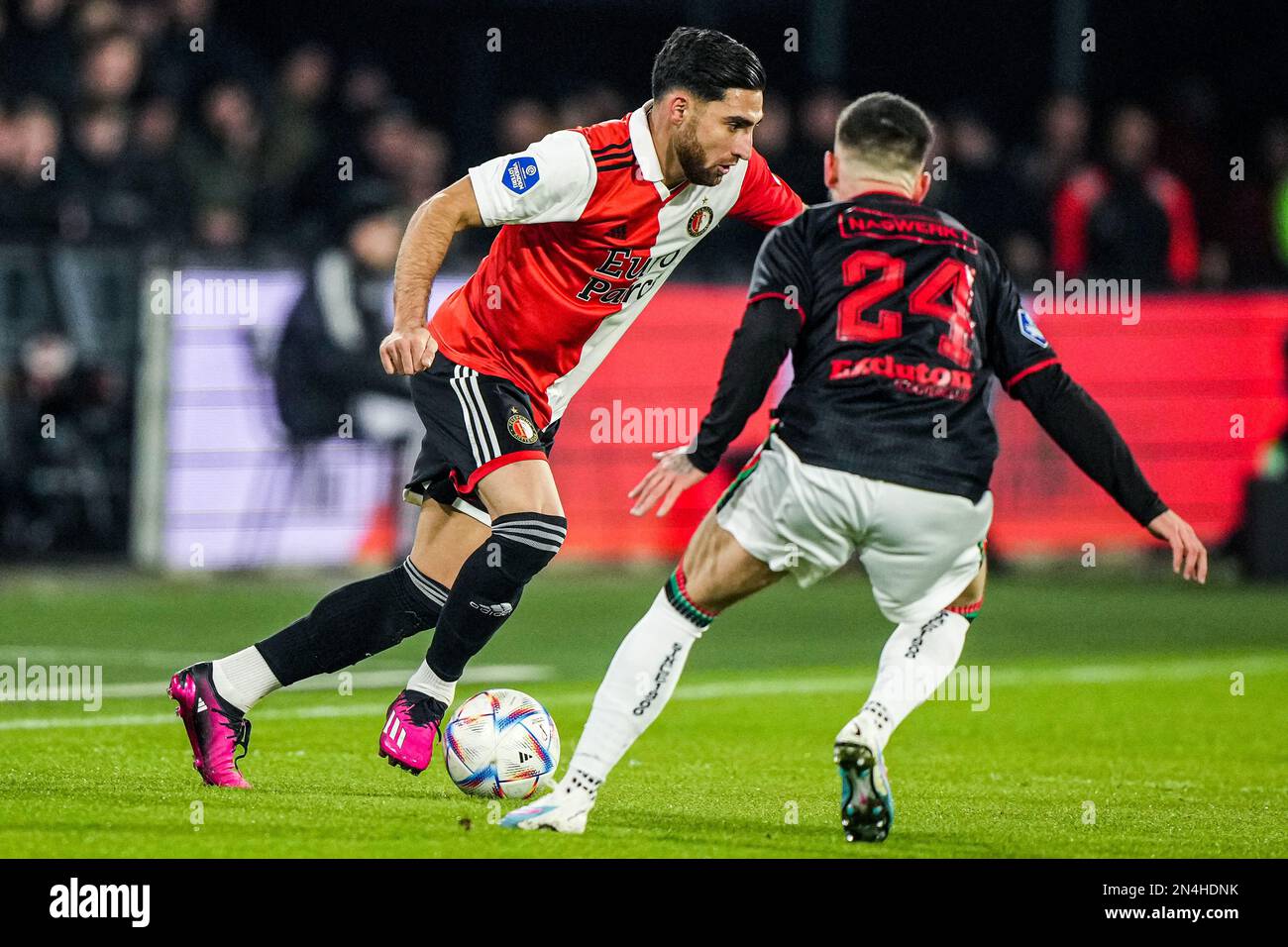 Rotterdam - Alireza Jahanbakhsh of Feyenoord, Calvin Verdonk of NEC Nijmegen during the match ...