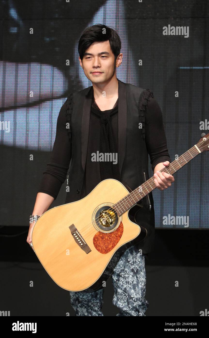 Taiwanese singer Jay Chou poses for photographers during the Golden ...