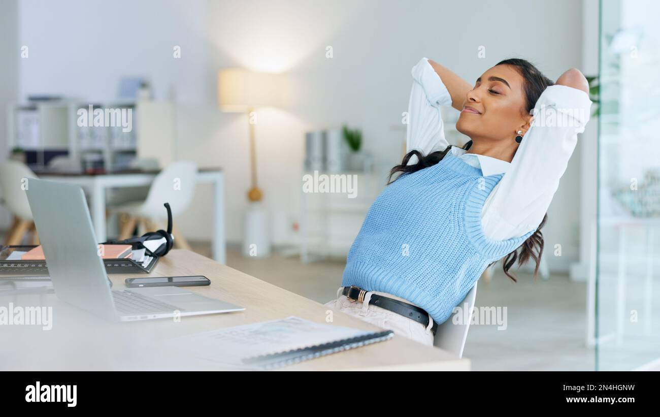 Business woman relaxing after finally finishing a deadline and working ...