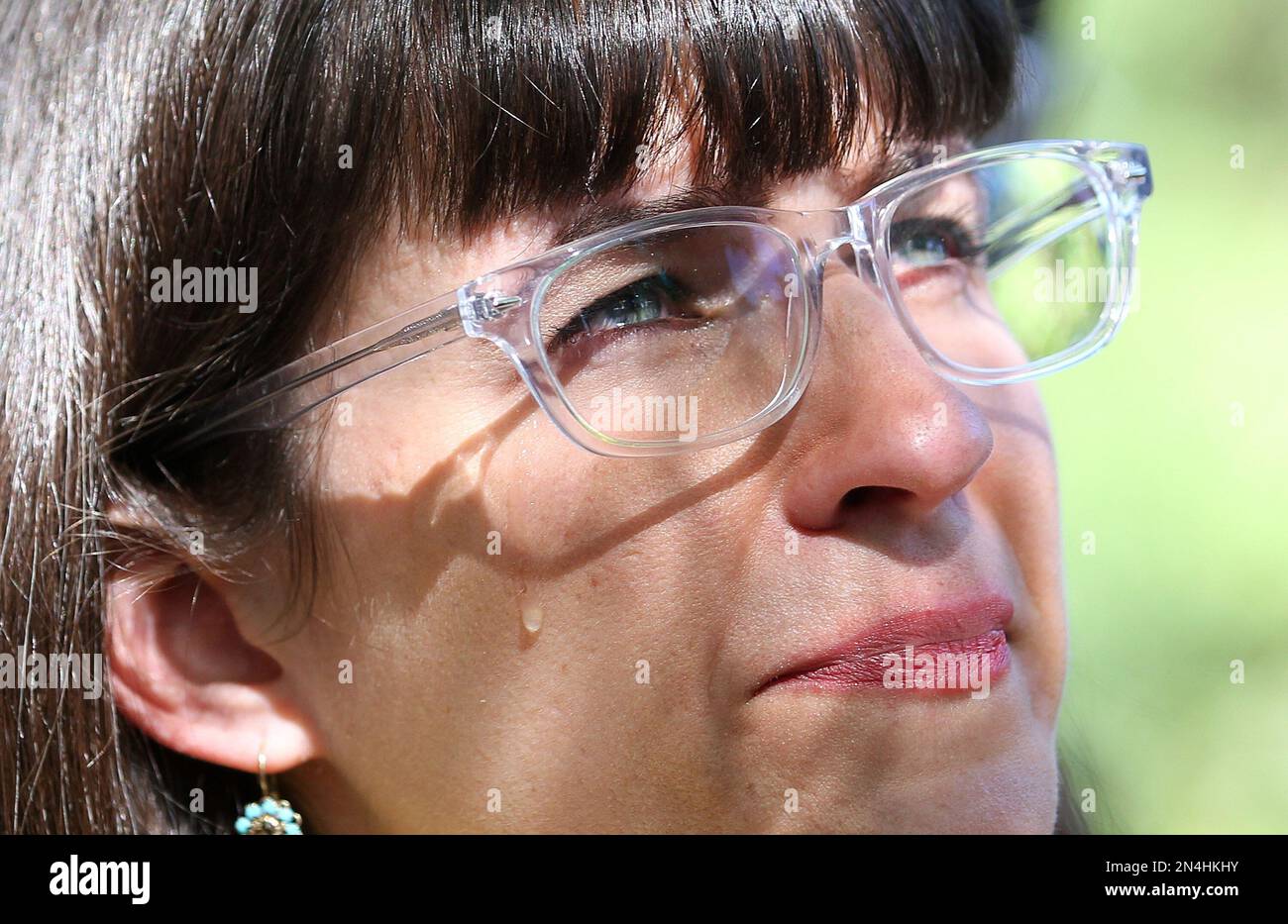 In this Sunday, June 22, 2014 photo, a tear rolls down the face of Kate ...