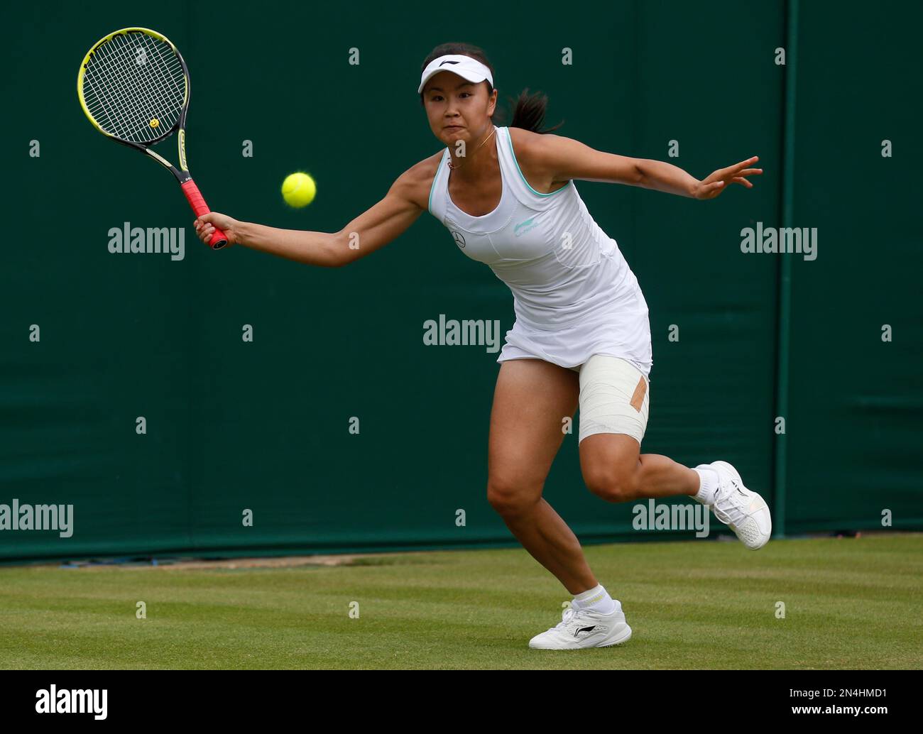 Peng Shuai of China plays a return to Johanna Konta of Britain during ...