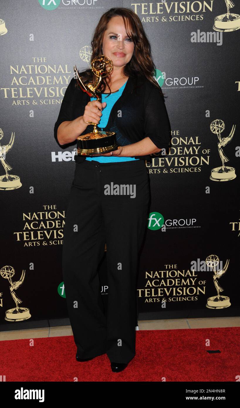 Crystal Chappell poses in the press room with the award for outstanding ...