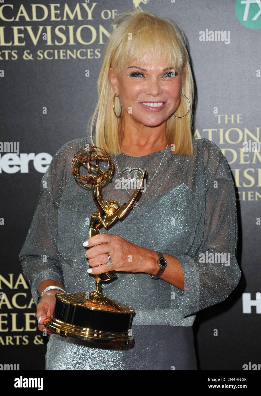 Linda Bell Blue poses in the press room with the award for outstanding ...