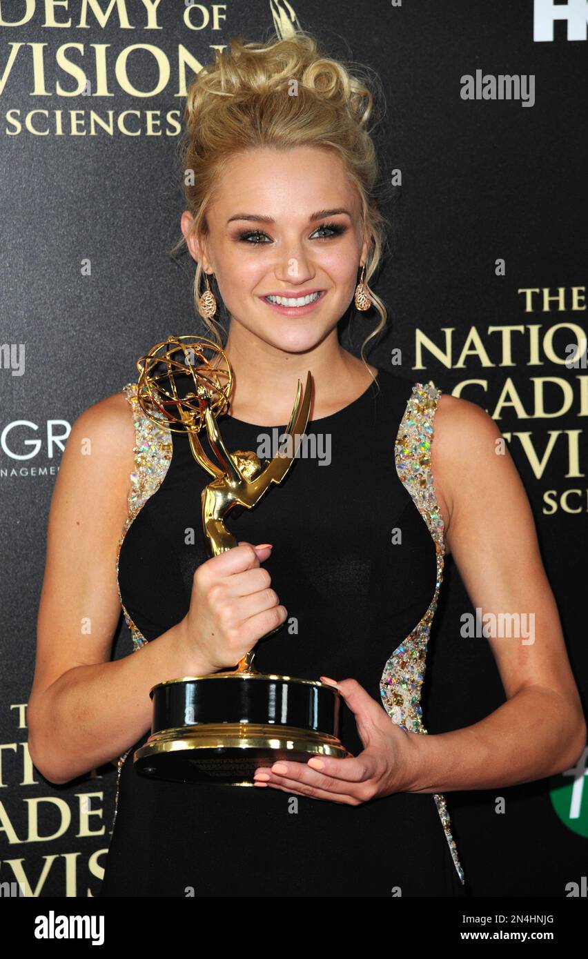 Hunter King poses in the press room with the award for outstanding ...