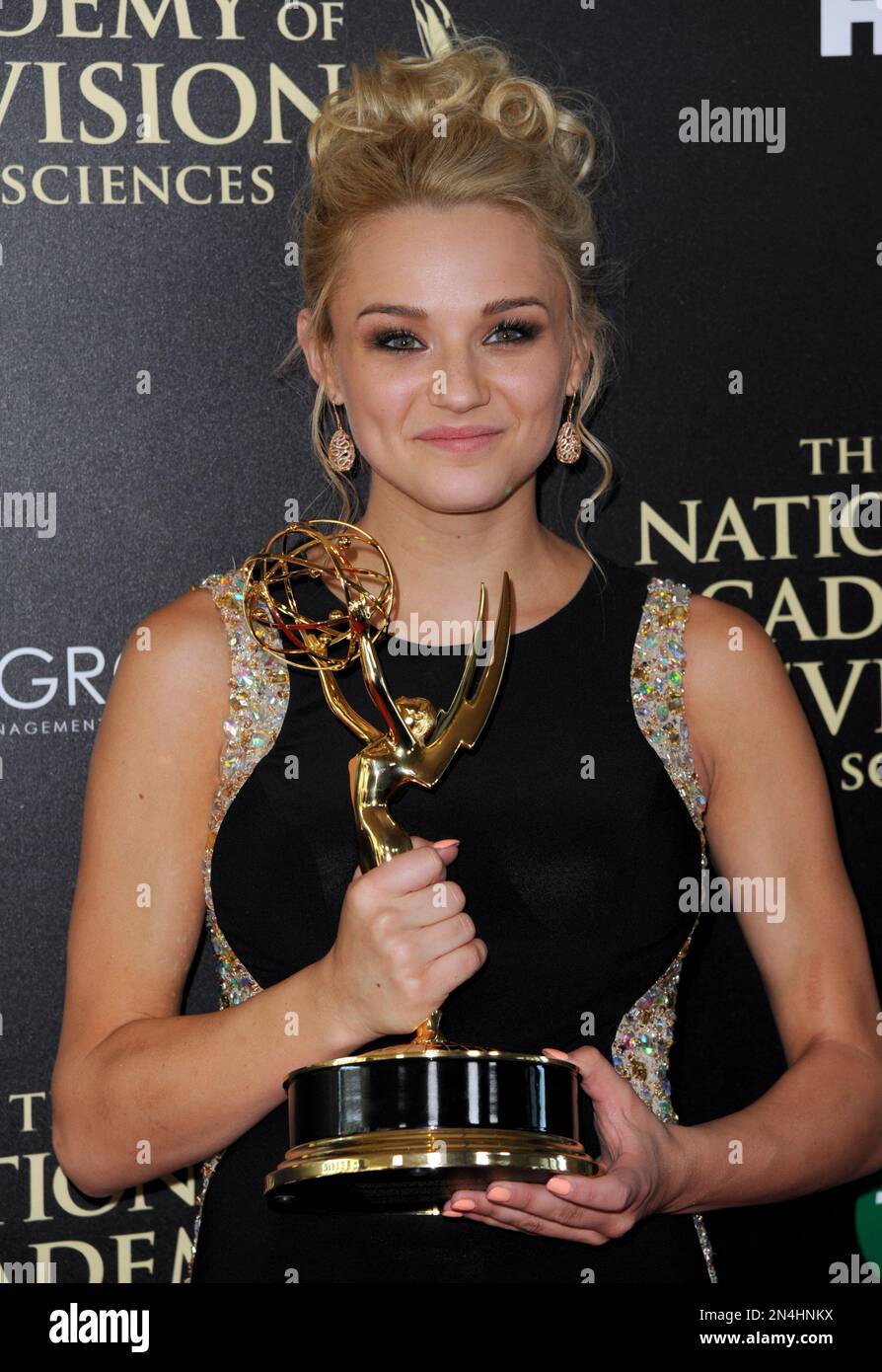 Hunter King poses in the press room with the award for outstanding ...