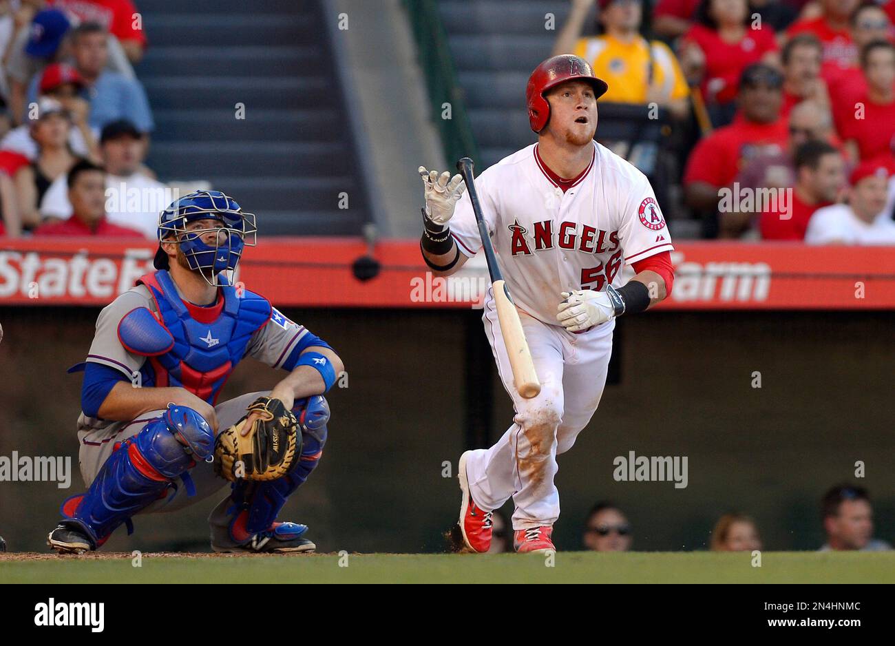 Los Angeles Angels' Kole Calhoun, right, hits a two-run home run as ...