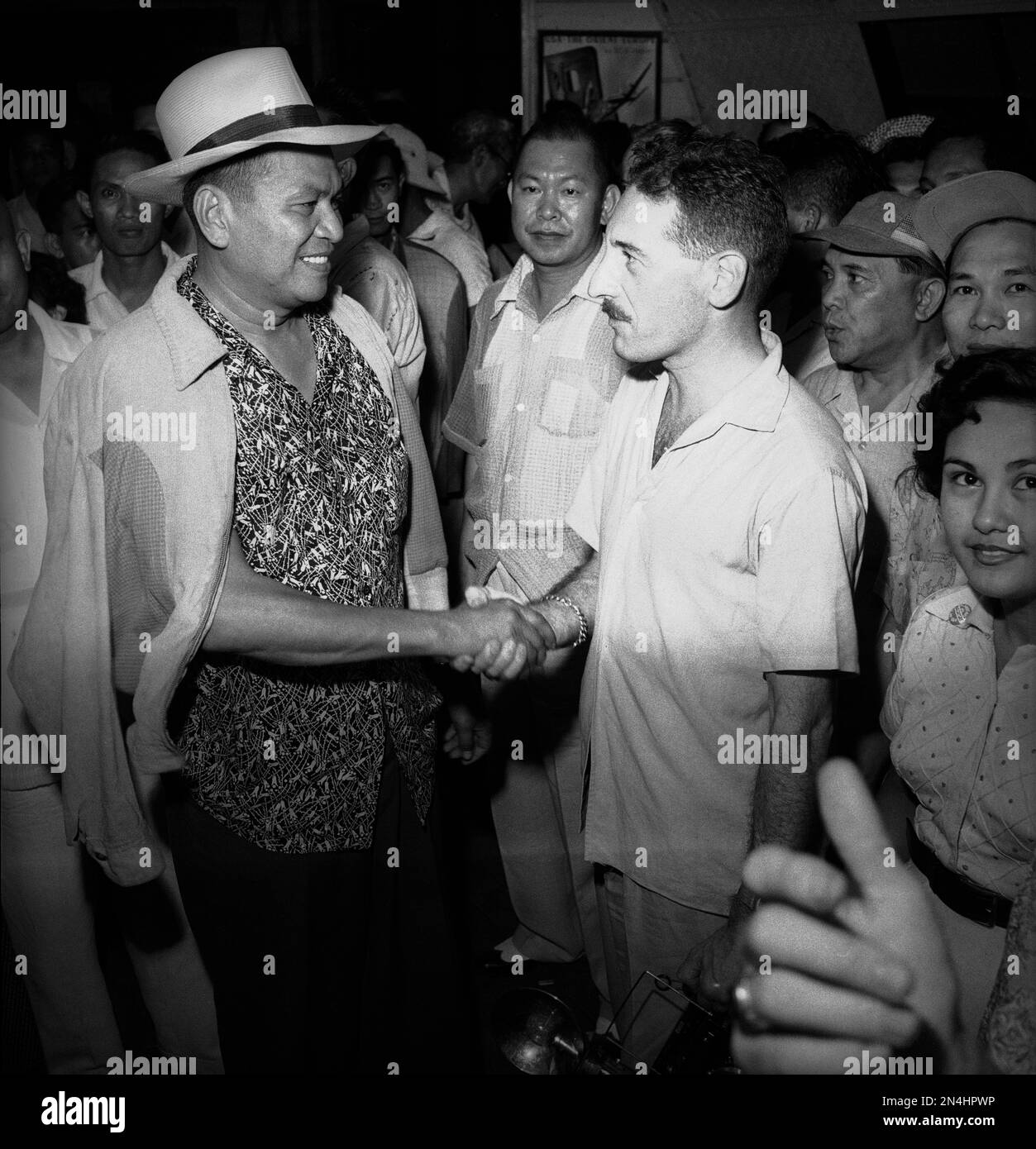 Associated Press photographer Max Desfor, right, celebrates his ...