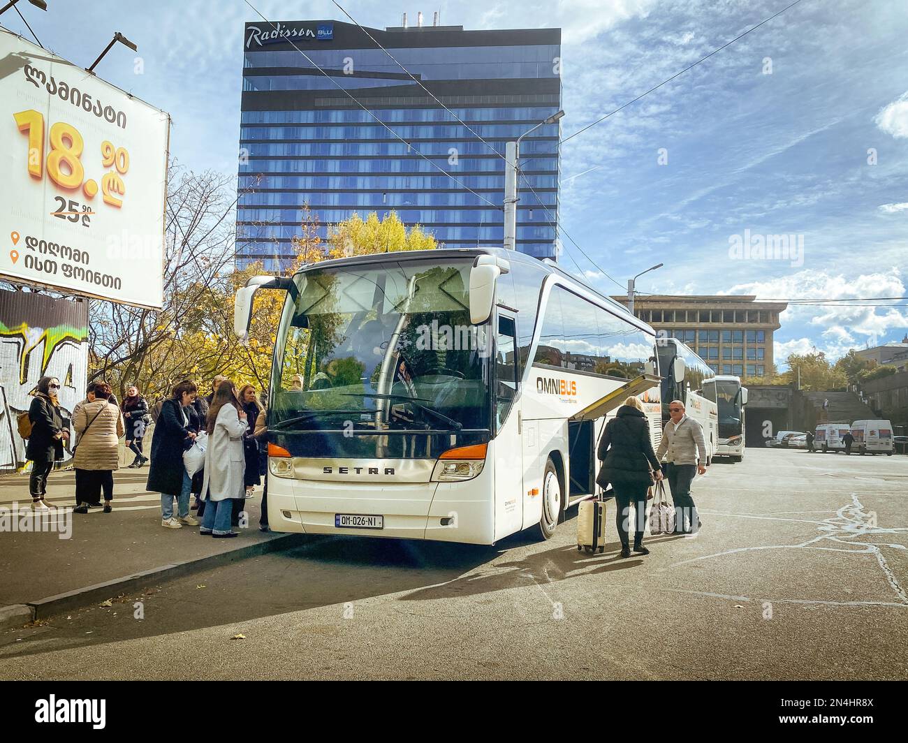 Tbilisi, Georgia - 13th november, 2022: Passengers stand by Omni Bus ...