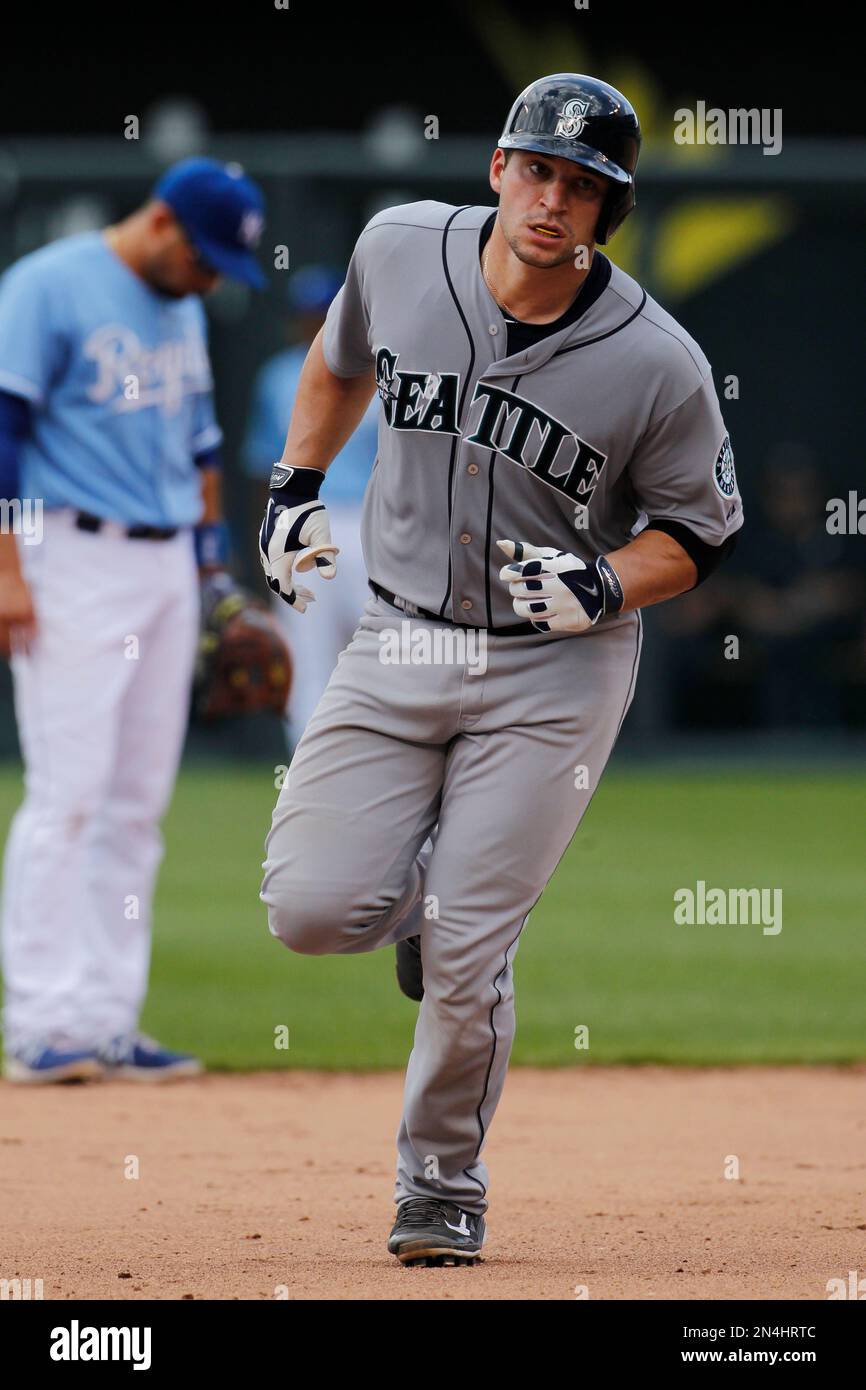 Seattle Mariners' Mike Zunino rounds the bases after hitting a home run ...