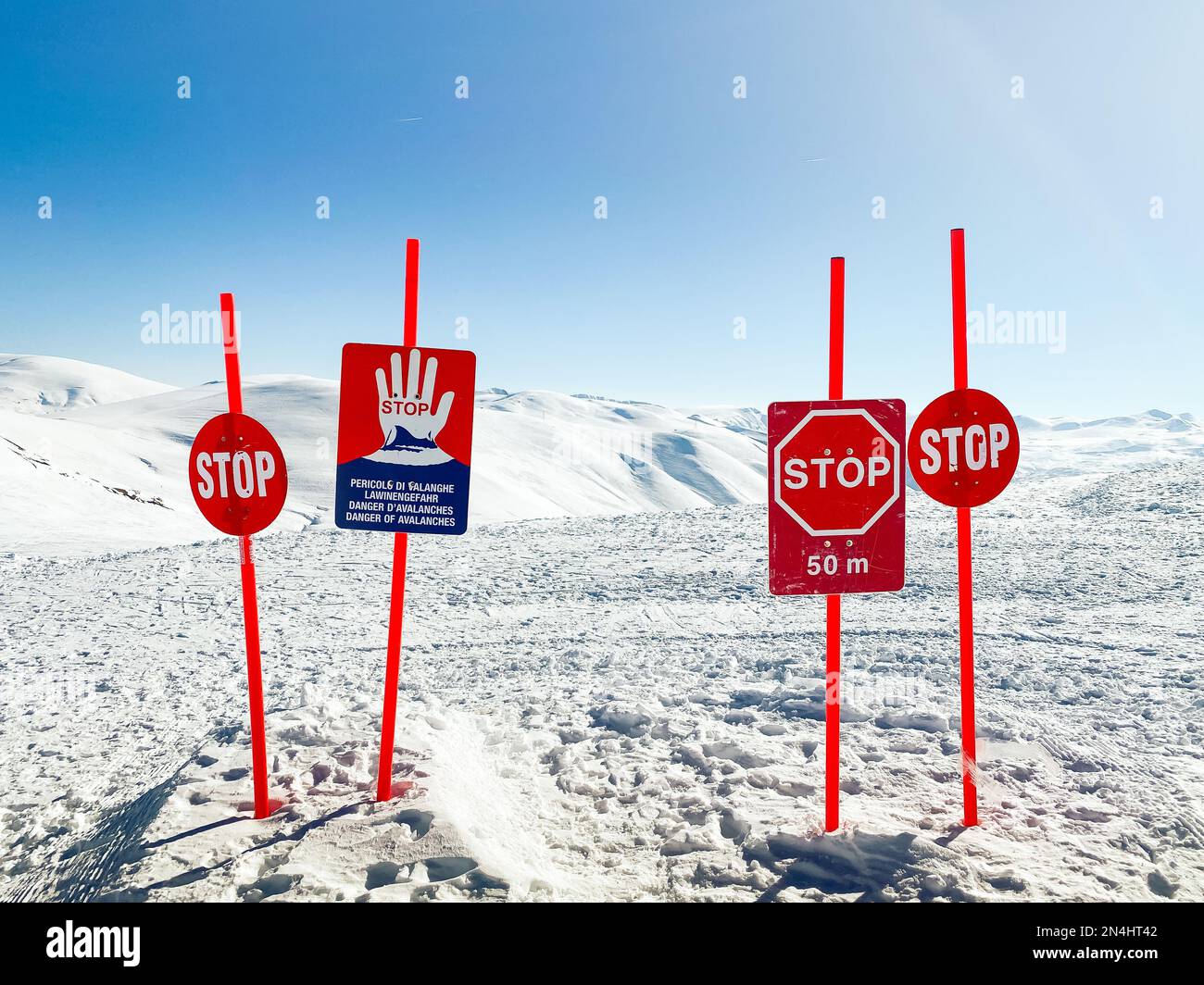 Avalanche danger top off piste sign posts in snowy mountains in Georgia ...