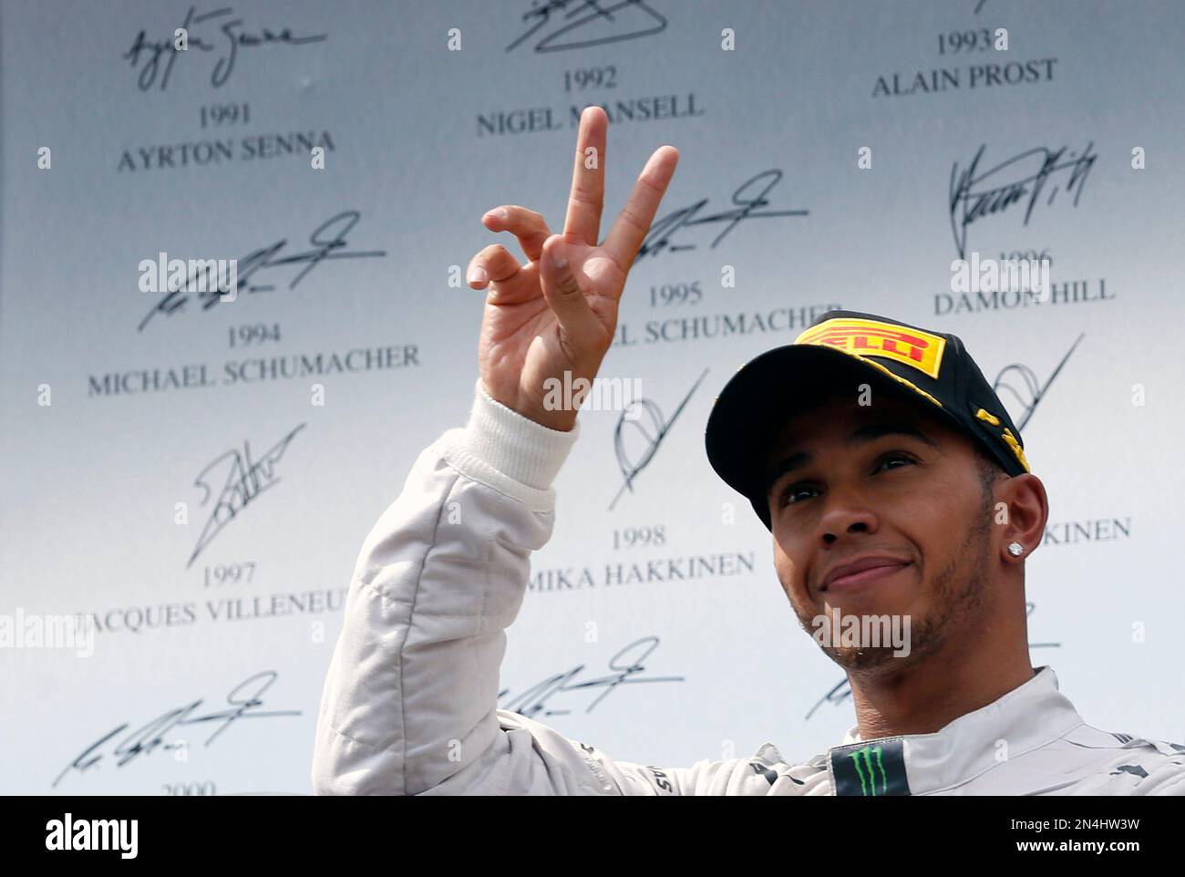 Second placed Mercedes driver Lewis Hamilton of Britain flashes the ...