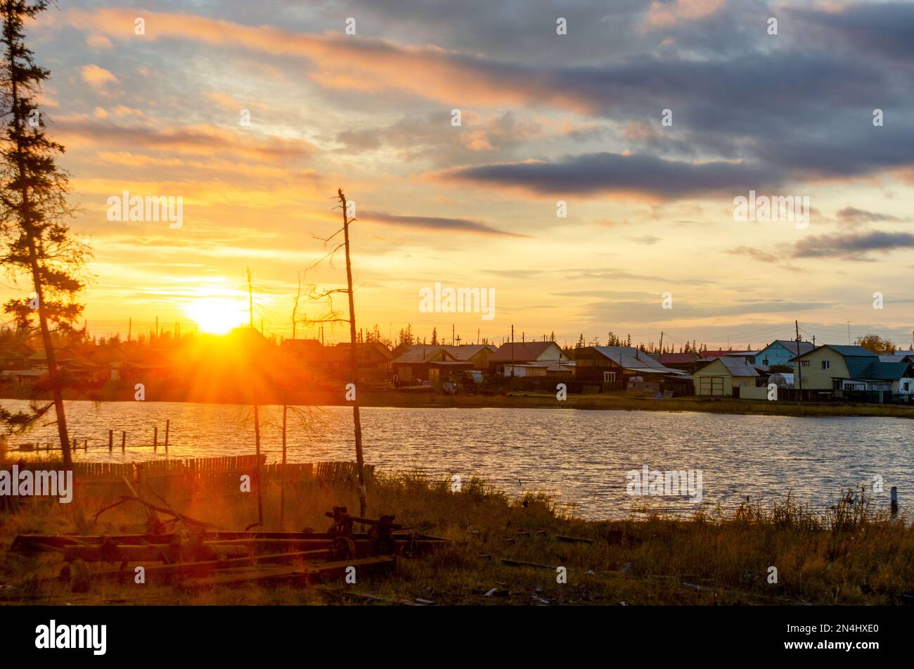 Bright colorful sunset in the village of Yakutia Suntar on the ...