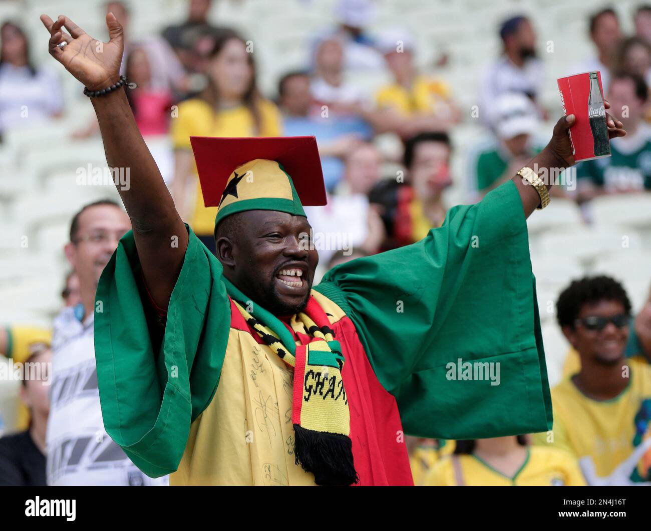 A Ghana supporter cheers for his national team before the group G World ...