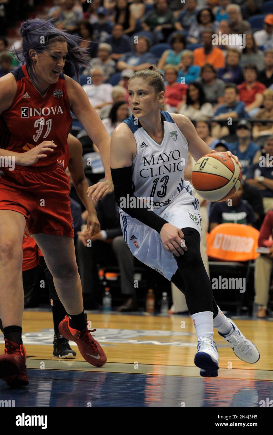 Minnesota Lynx guard Lindsey Whalen, right, drives against Washington ...
