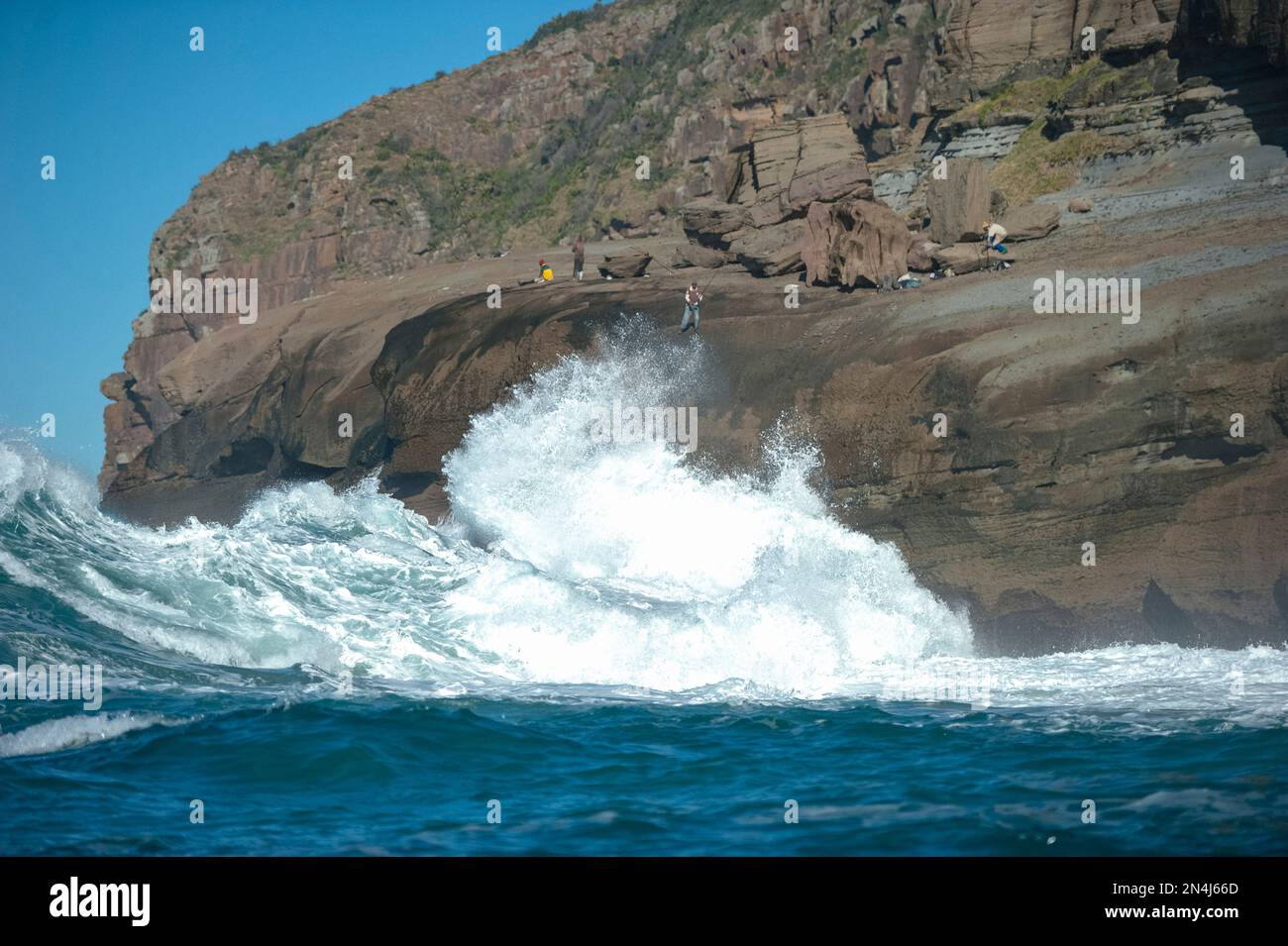 Men fishing on coast with large waves, Port St Johns, Wild Coast ...