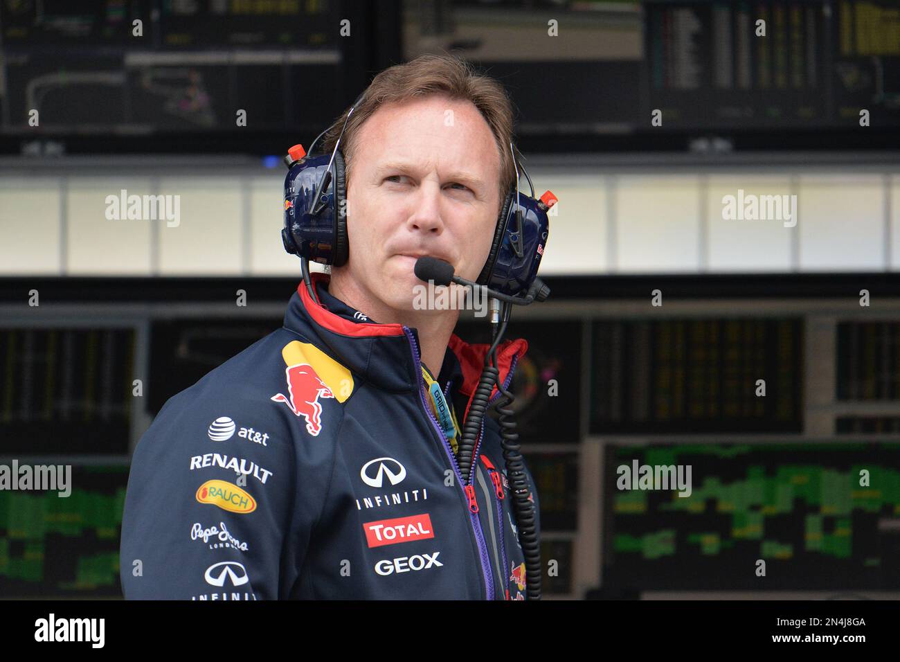 Red Bull team principal Christian Horner stands in front of the ...