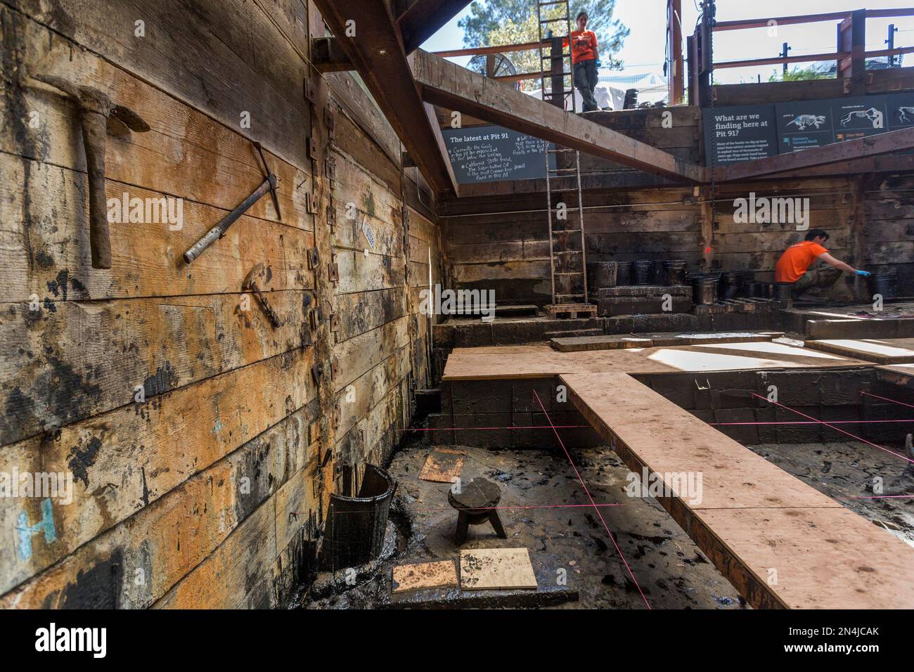 Excavators work at the bottom of the reactivated Pit 91 at the Page ...